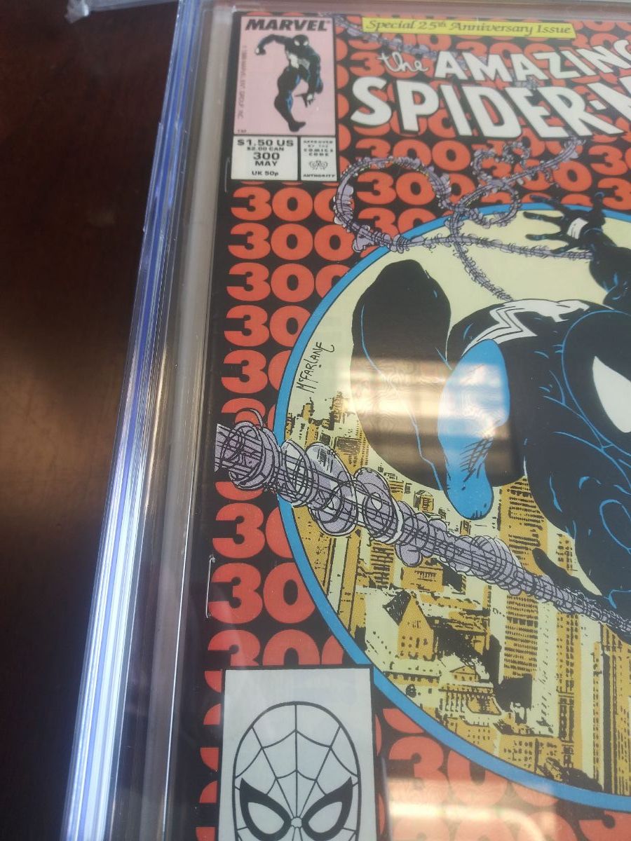 ASM 300 weird staple placement - Comic Book Grading and Restoration ...